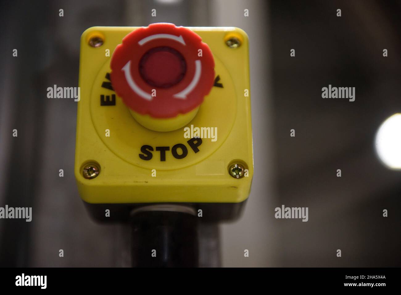 Red emergency stop button close-up Stock Photo - Alamy