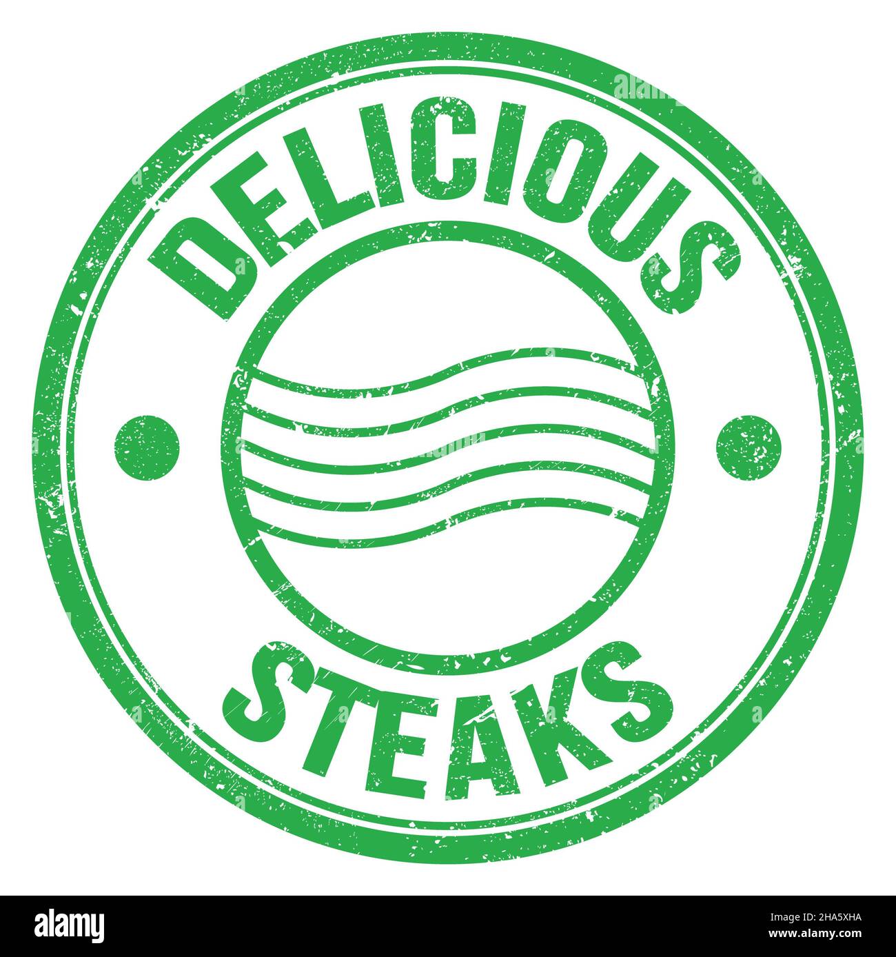 DELICIOUS STEAKS text written on green round postal stamp sign Stock ...