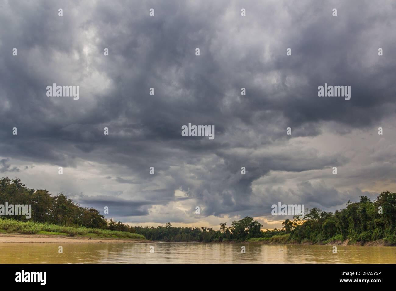 Dark clouds above Kinabatangan river, Sabah, Malaysia Stock Photo - Alamy