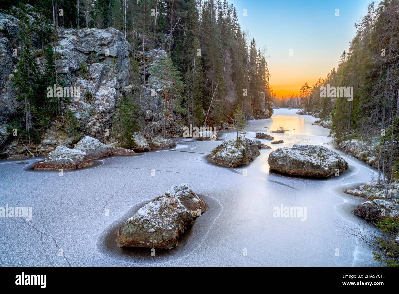 river with rock and ice,trees and sunrise Stock Photo - Alamy
