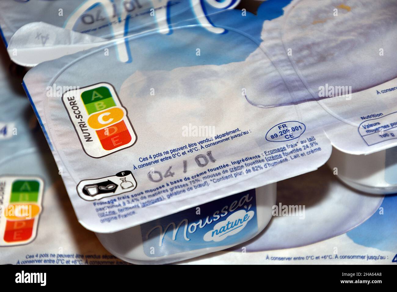 View of a nutri-score code on the white cheese packaging.The nutri ...