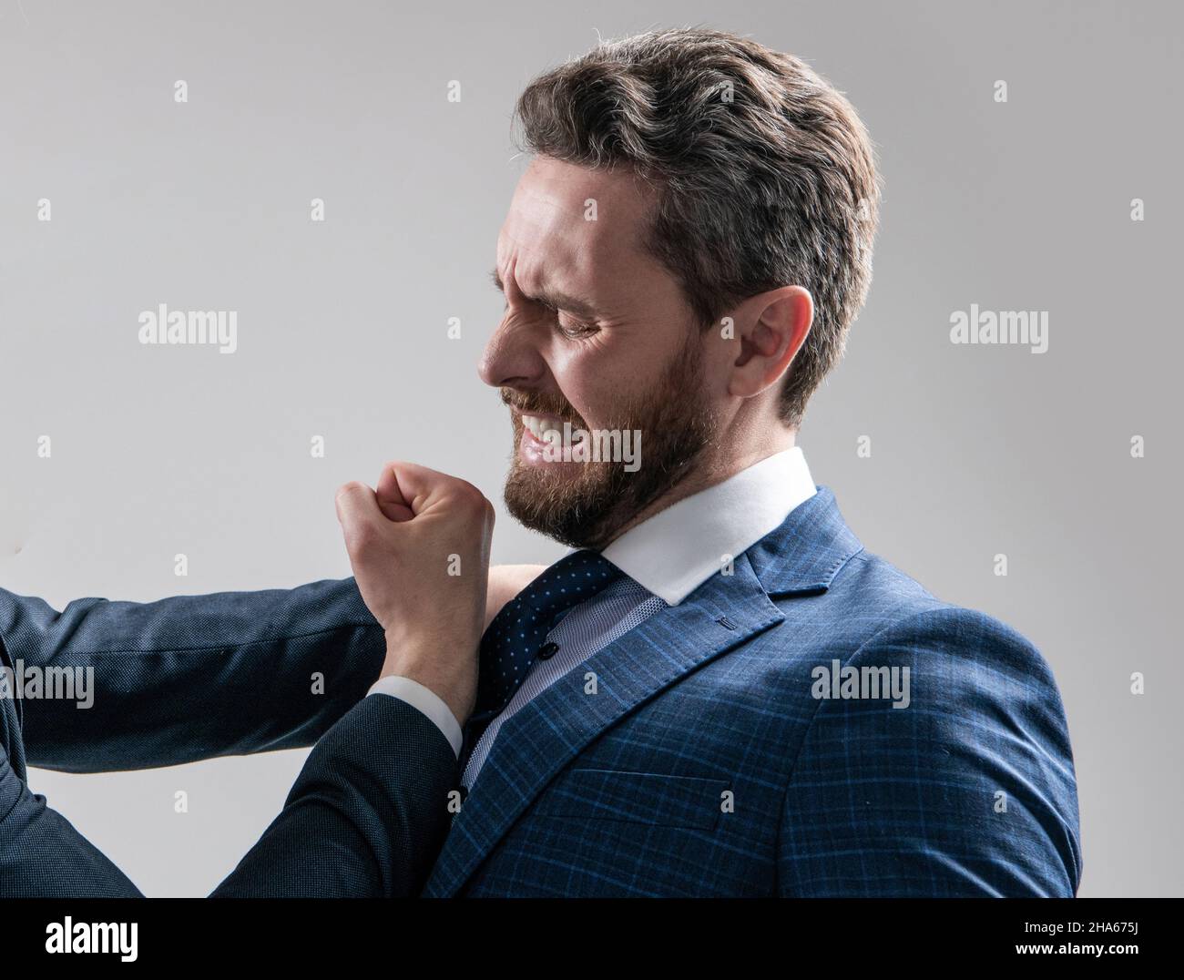 Fighting has been going on. Businessman defend punch. Fist fighting ...