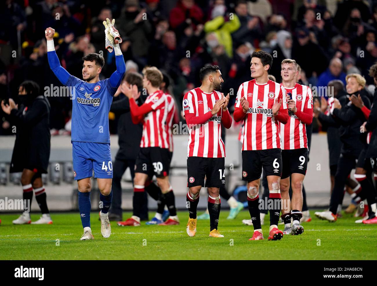 Brentford goalkeeper Alvaro Fernandez (left) celebrates at the end of ...
