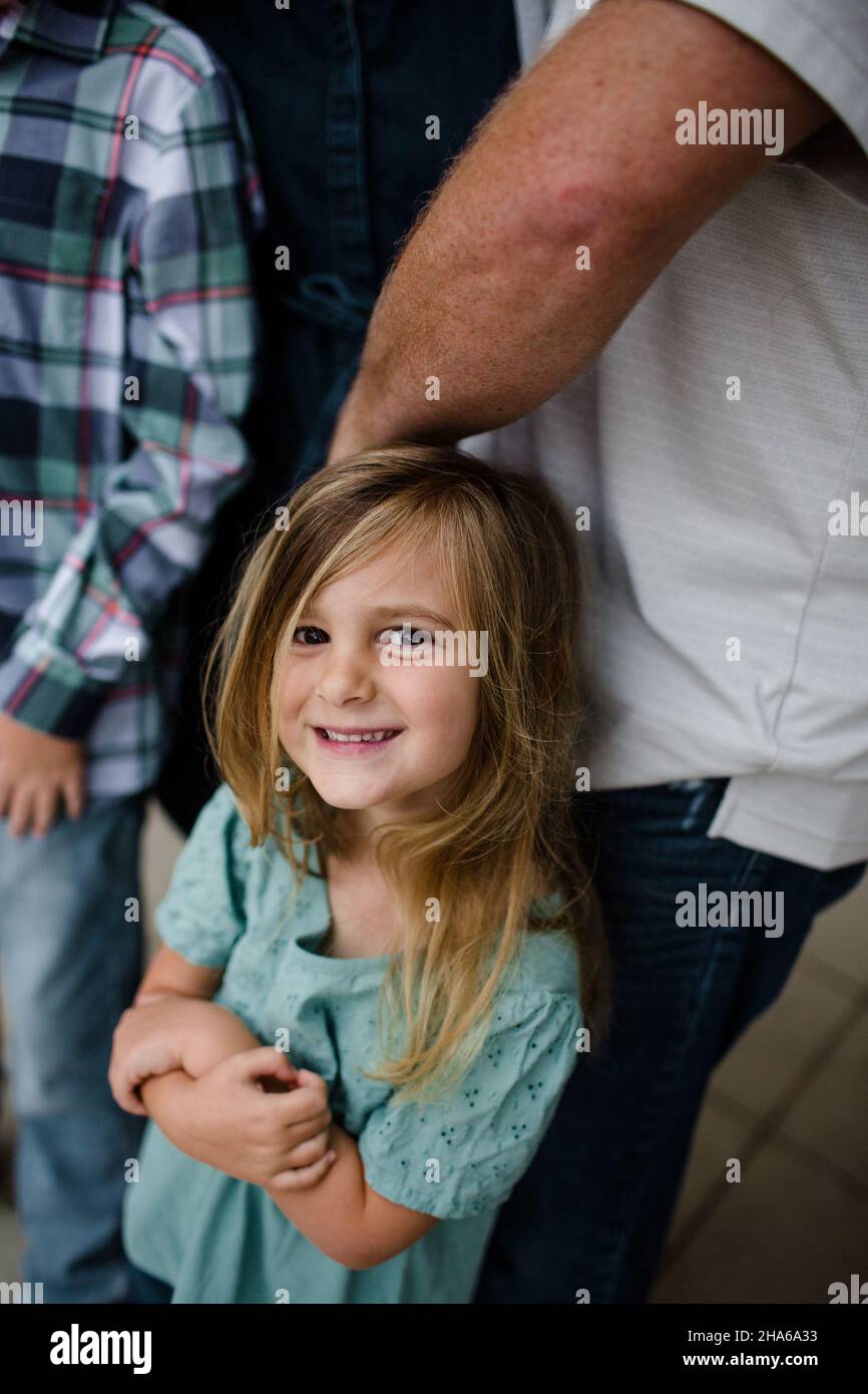 Close Up of Four Year Old Standing in Front of Dad in San Diego Stock ...