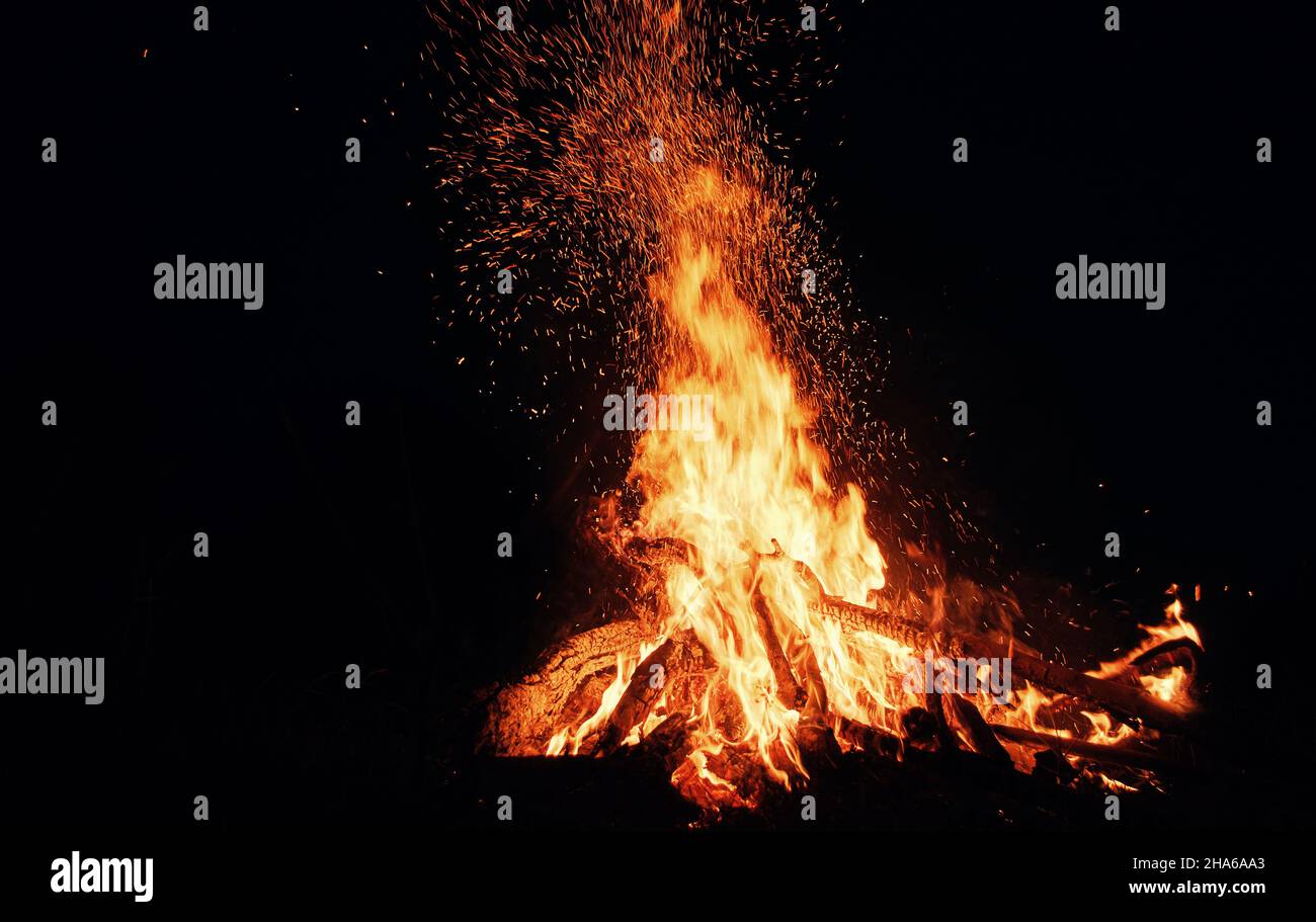 The flakes from flame in the fireplace Stock Photo - Alamy