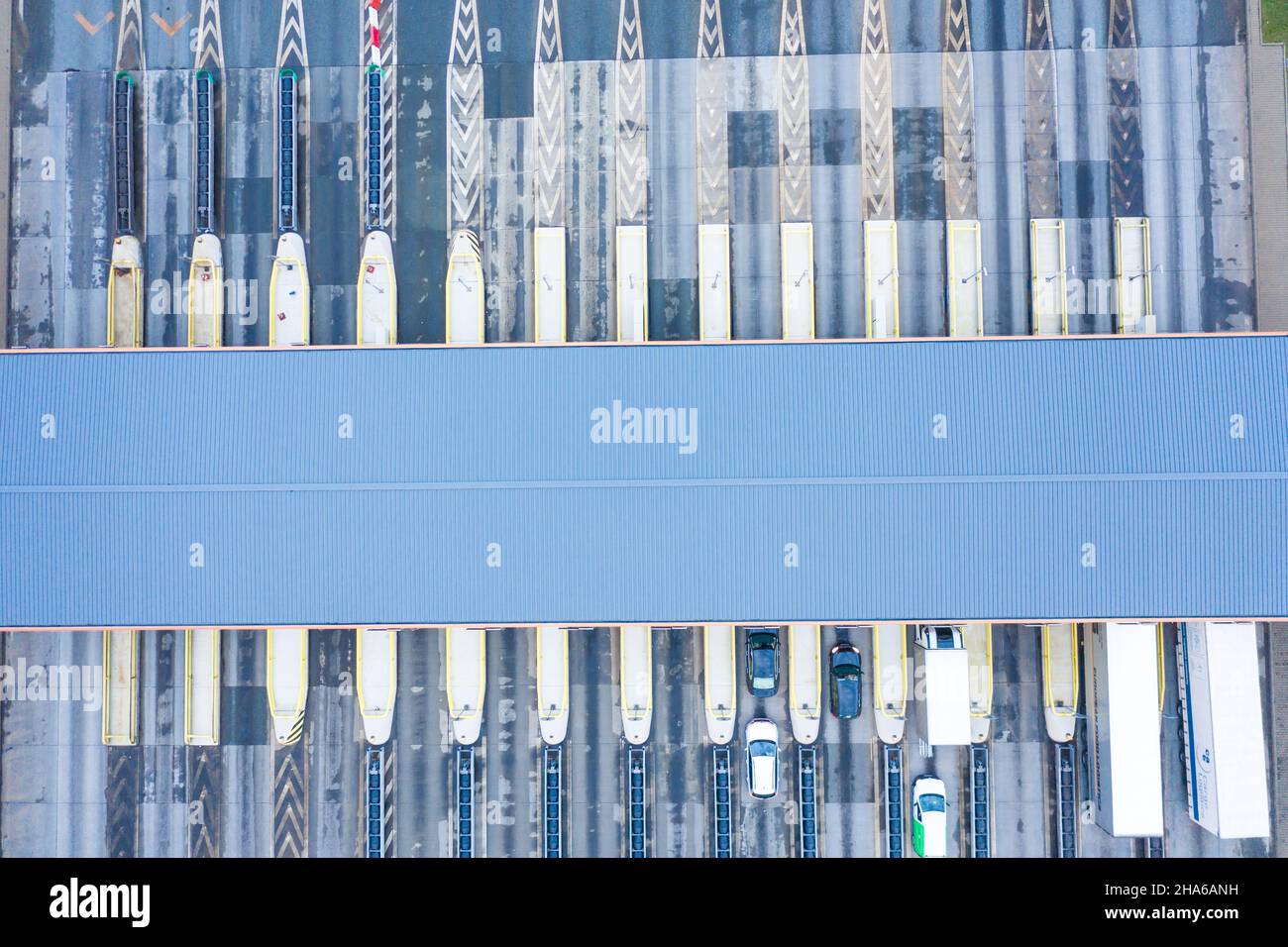 Aerial drone view on toll collection point on motorway at night. Pay ...