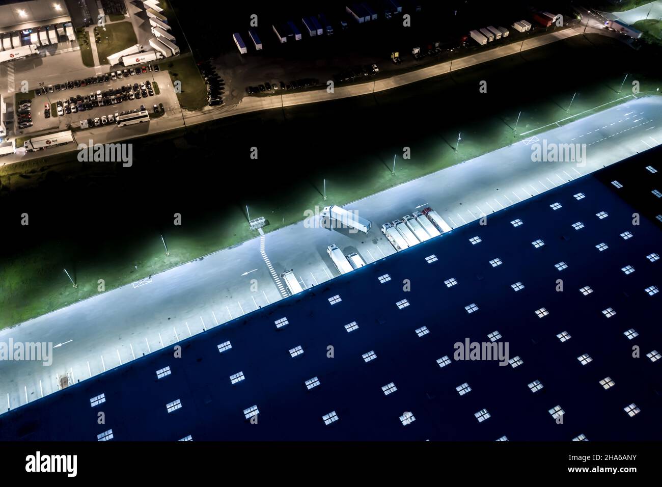 Night Loading dock at a warehouse. modern logistics center. docking ...