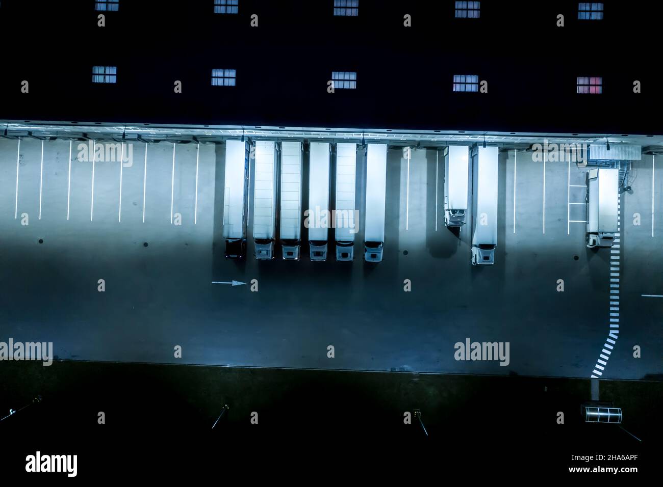 Night Loading dock at a warehouse. modern logistics center. docking ...