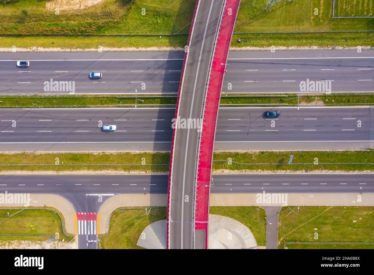 Aerial top view of bridge road automobile traffic of many cars ...