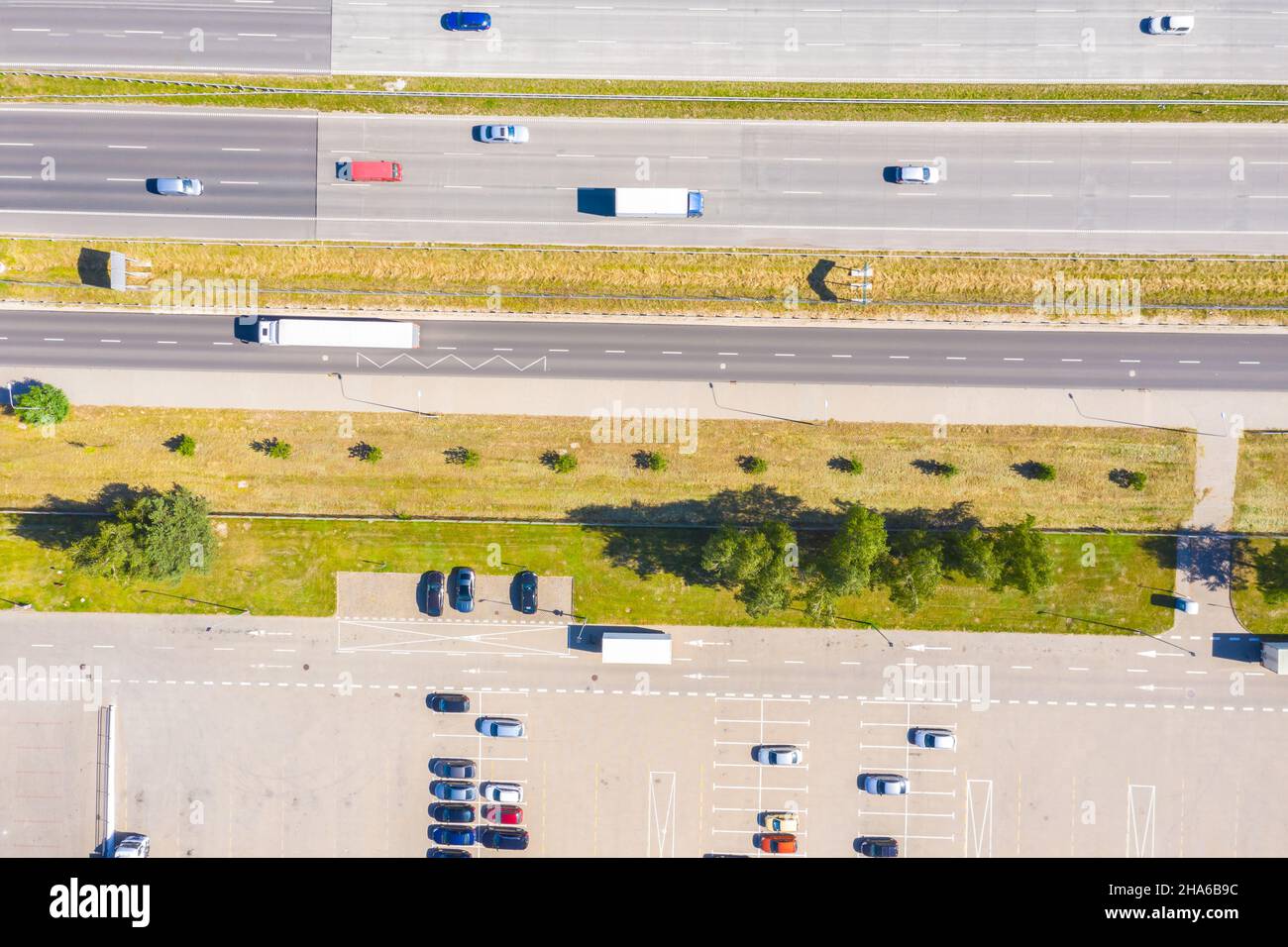 Aerial Shot of Industrial Loading Area where Many Trucks Are Unloading ...