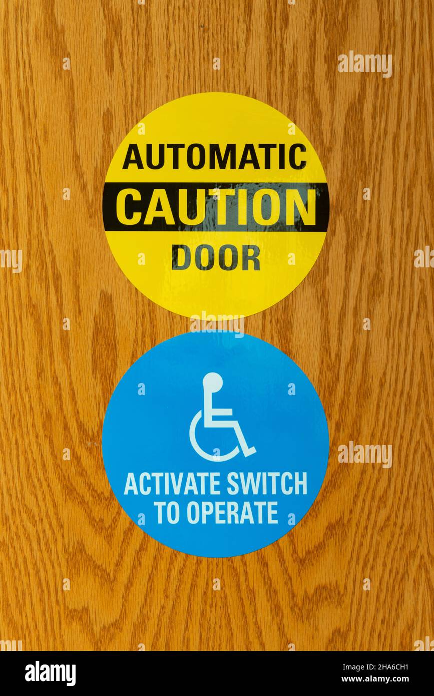 Automatic Door Caution Label Stock Photo - Alamy