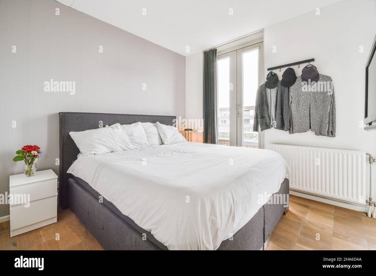 Stylish interior of contemporary room with comfortable bed Stock Photo ...