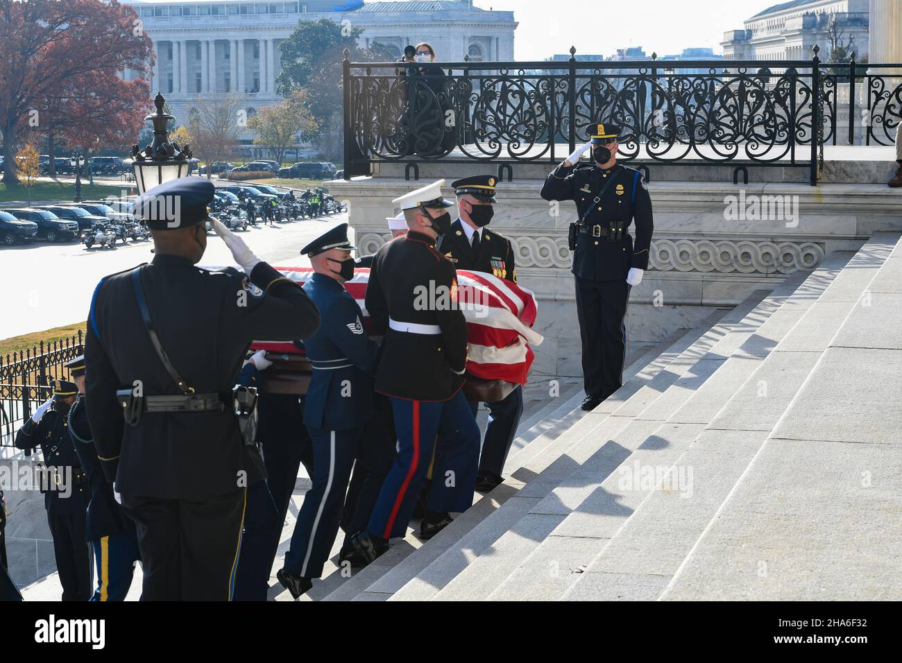 A Joint Casket Team carries the flag-draped casket of World War II ...