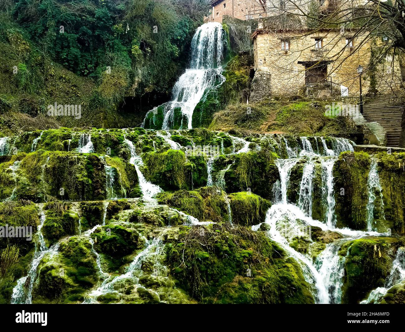 river waterfall in a village Stock Photo - Alamy