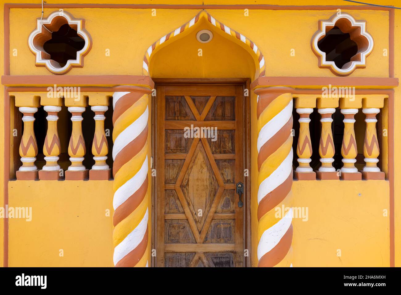 Colorful old city streets in historic city center of Tulum. It is a ...