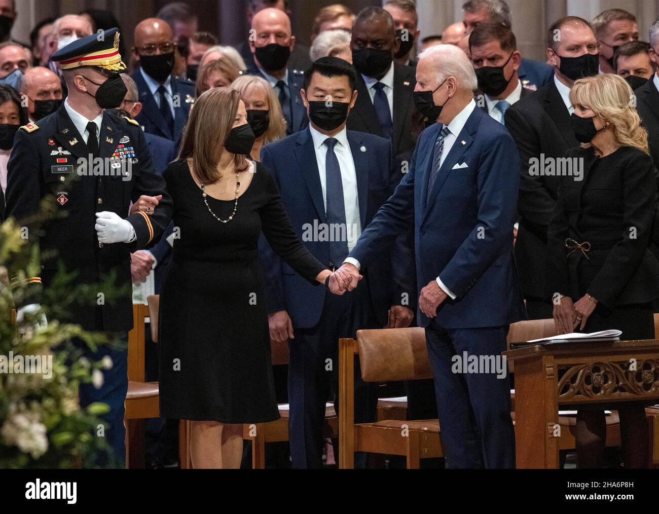 At Right. 10th Dec, 2021. Robin Dole, second left, daughter of former ...