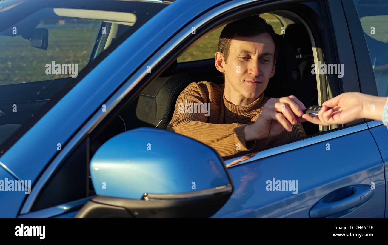 Car key handover hi-res stock photography and images - Alamy
