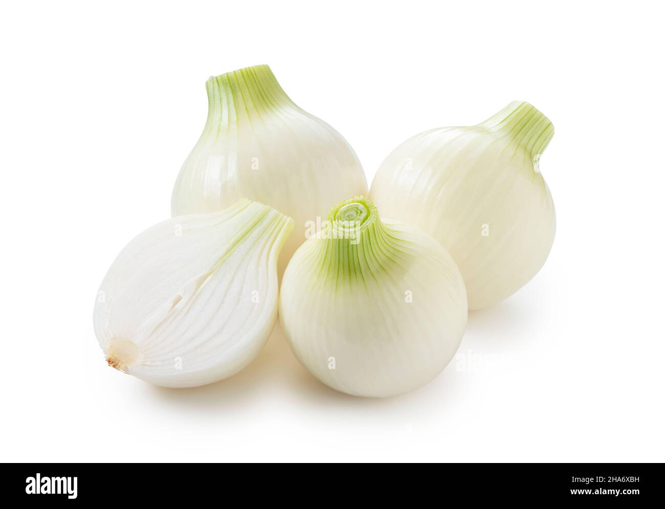 Peeled fresh onions and cut onions on a white background Stock Photo ...