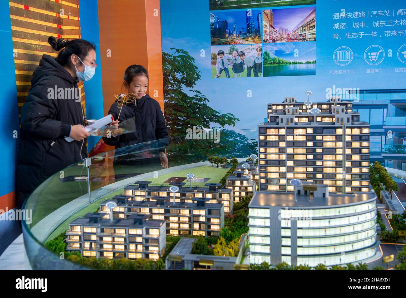HAIAN, CHINA - DECEMBER 11, 2021 - Residents view sand tables at the ...