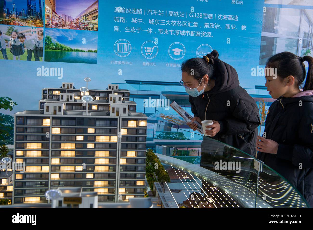 HAIAN, CHINA - DECEMBER 11, 2021 - Residents view sand tables at the ...