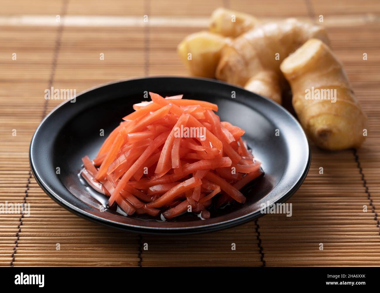 Red pickled ginger placed on a Japanese background. Image of red ...
