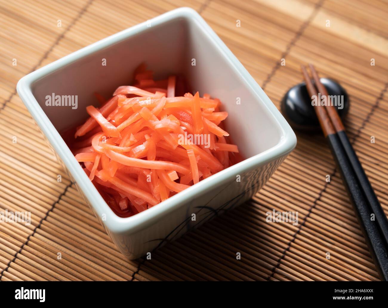 Red pickled ginger placed on a Japanese background. Image of red ...