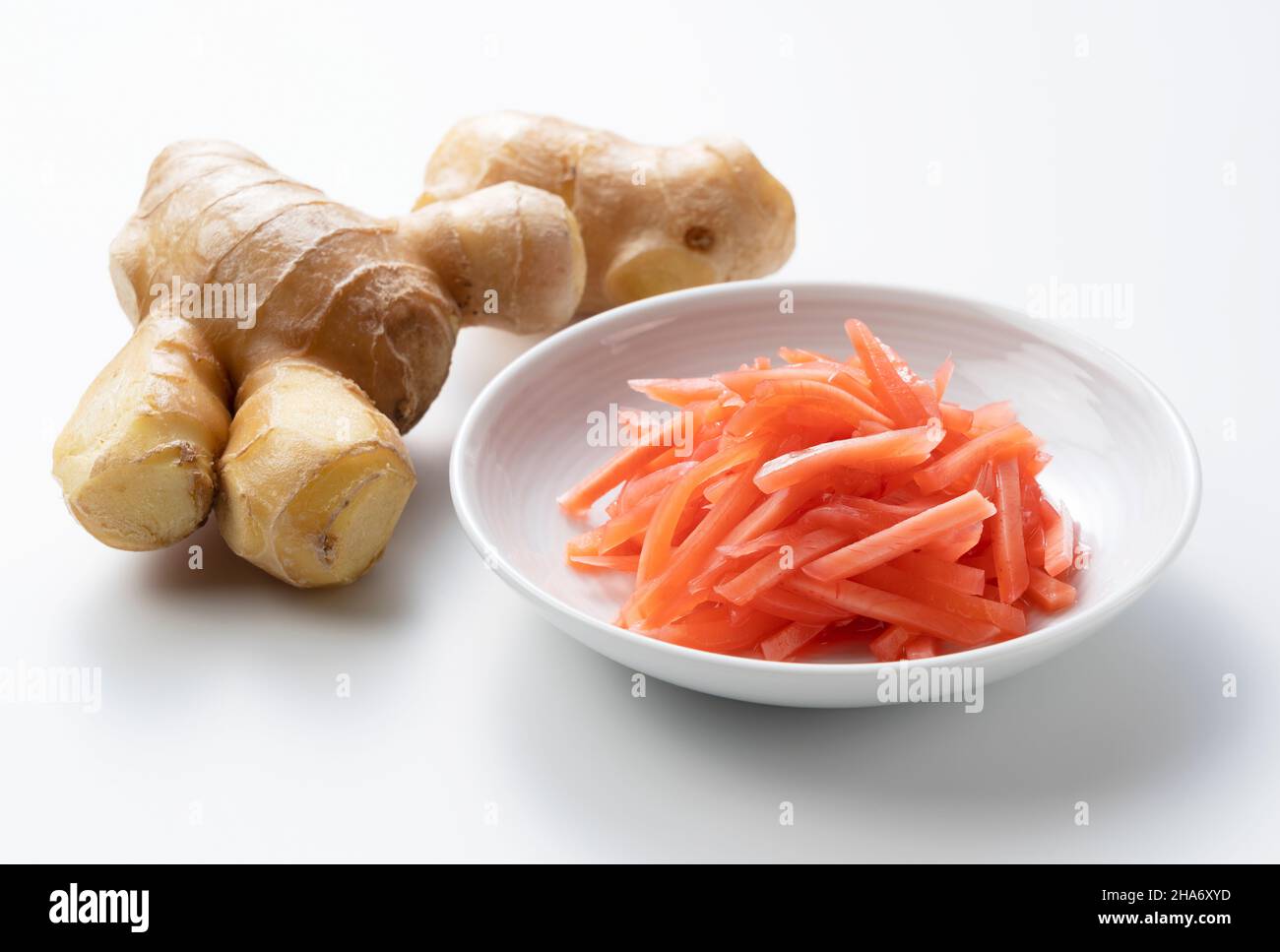 Red ginger placed on a white background. Red pickled ginger in Japan ...