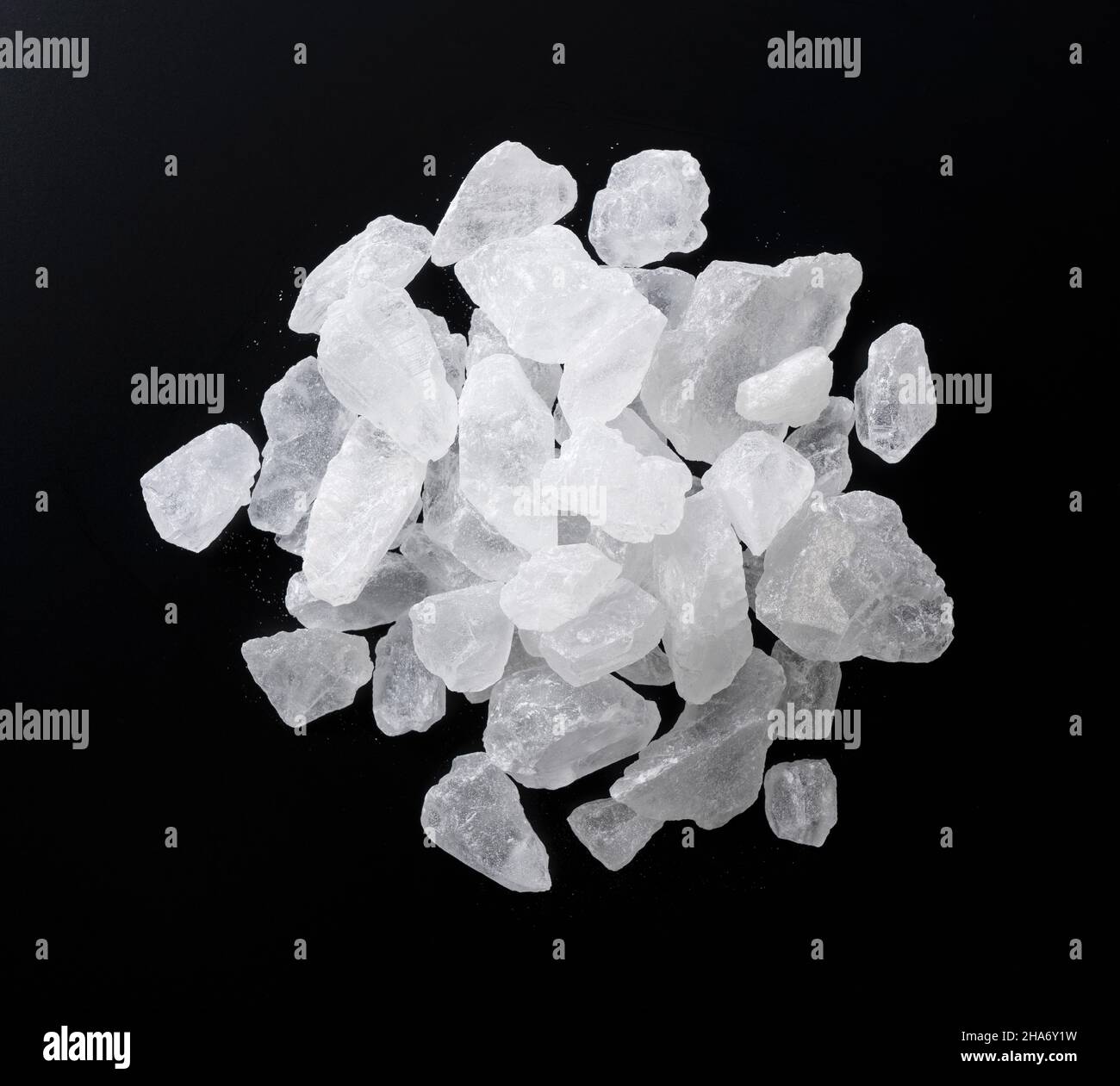 rock candy on a black background. View from above Stock Photo - Alamy
