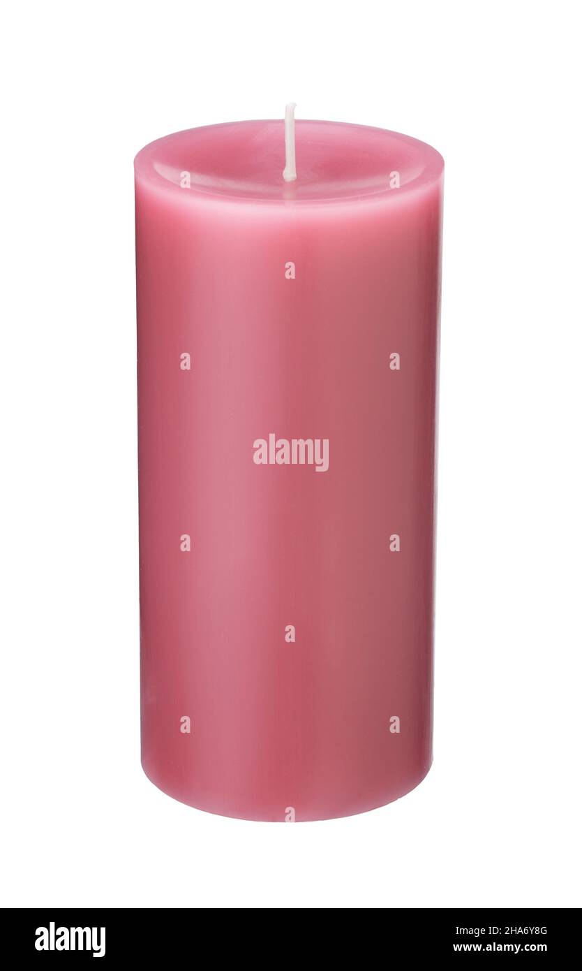A single pink candle on a white background Stock Photo - Alamy