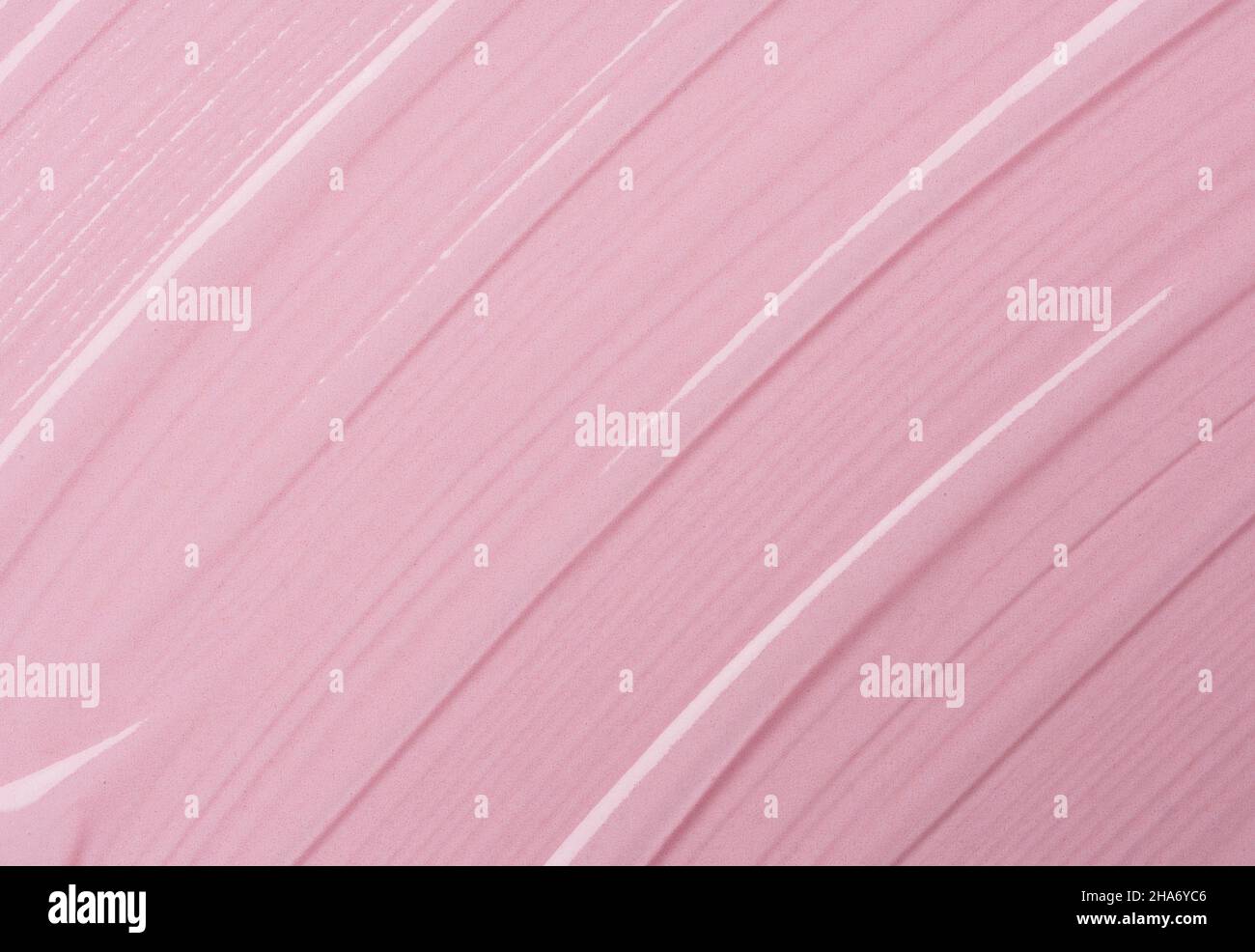 Serum texture on transparent liquid gel background with pink background ...
