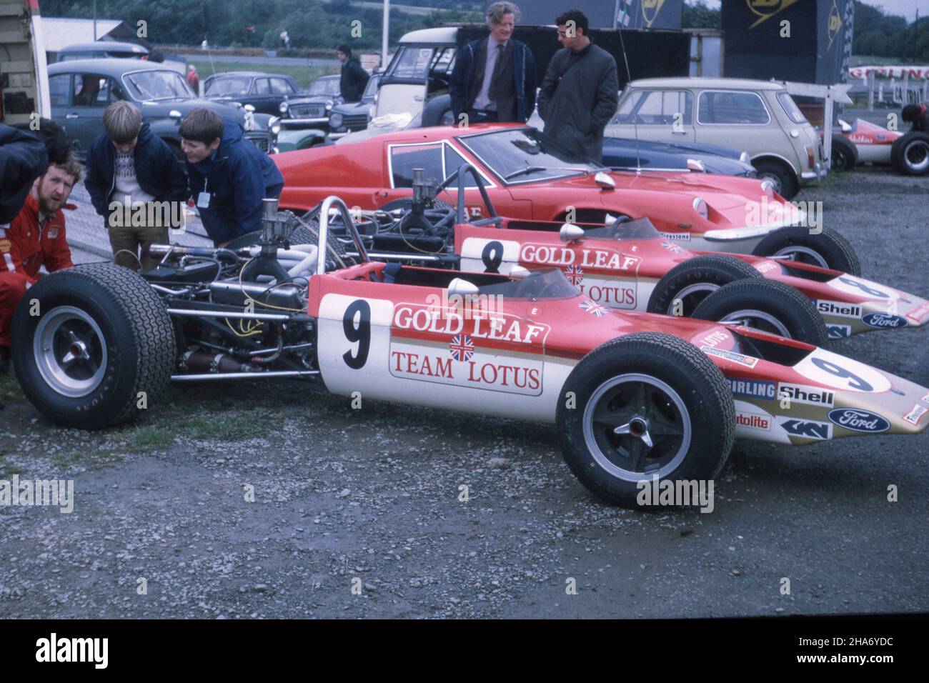 Mechanic working on Dave Walker's F3 Gold Leaf Team Lotus 59 in the ...