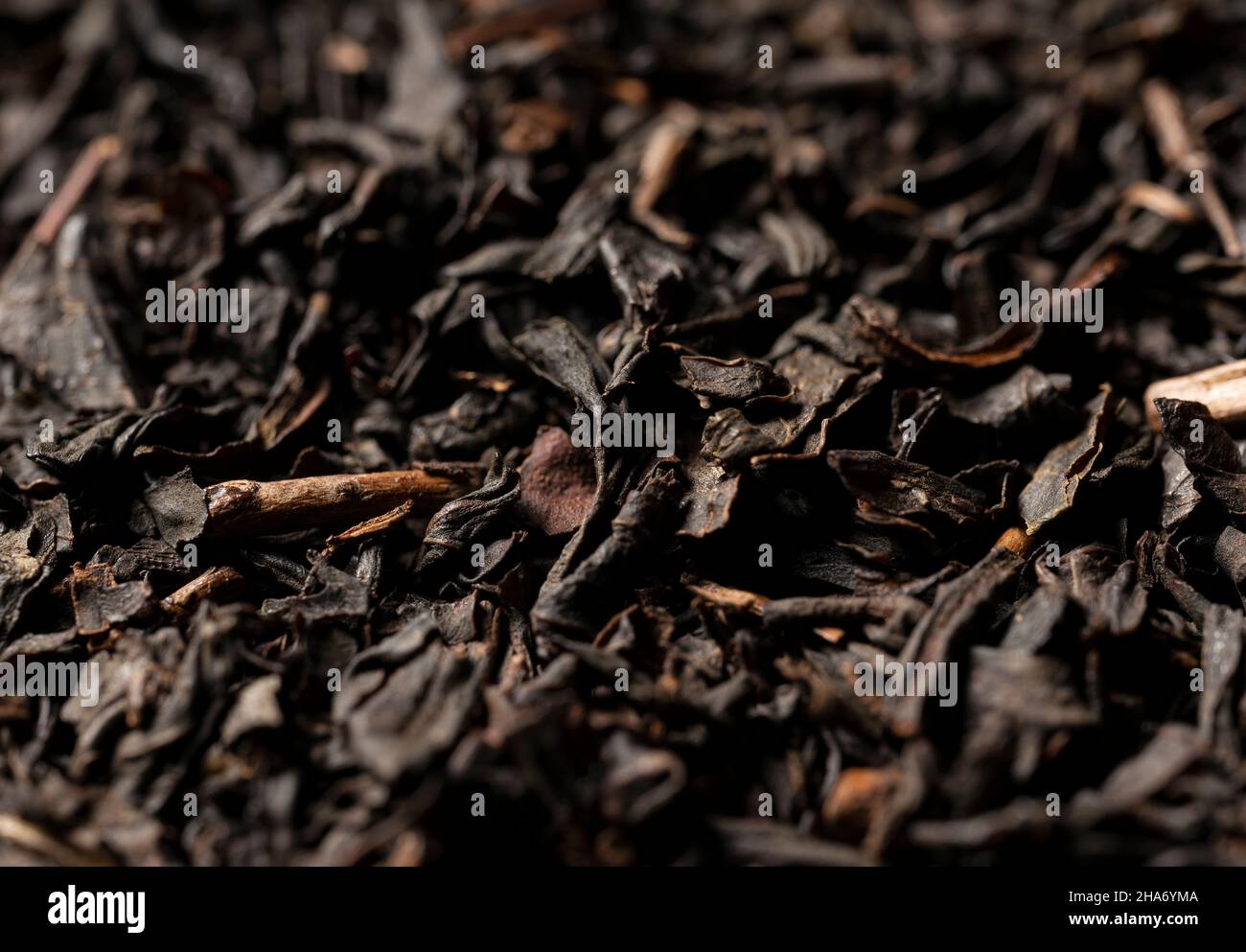 Black tea leaves all over the screen. Close-up Stock Photo - Alamy