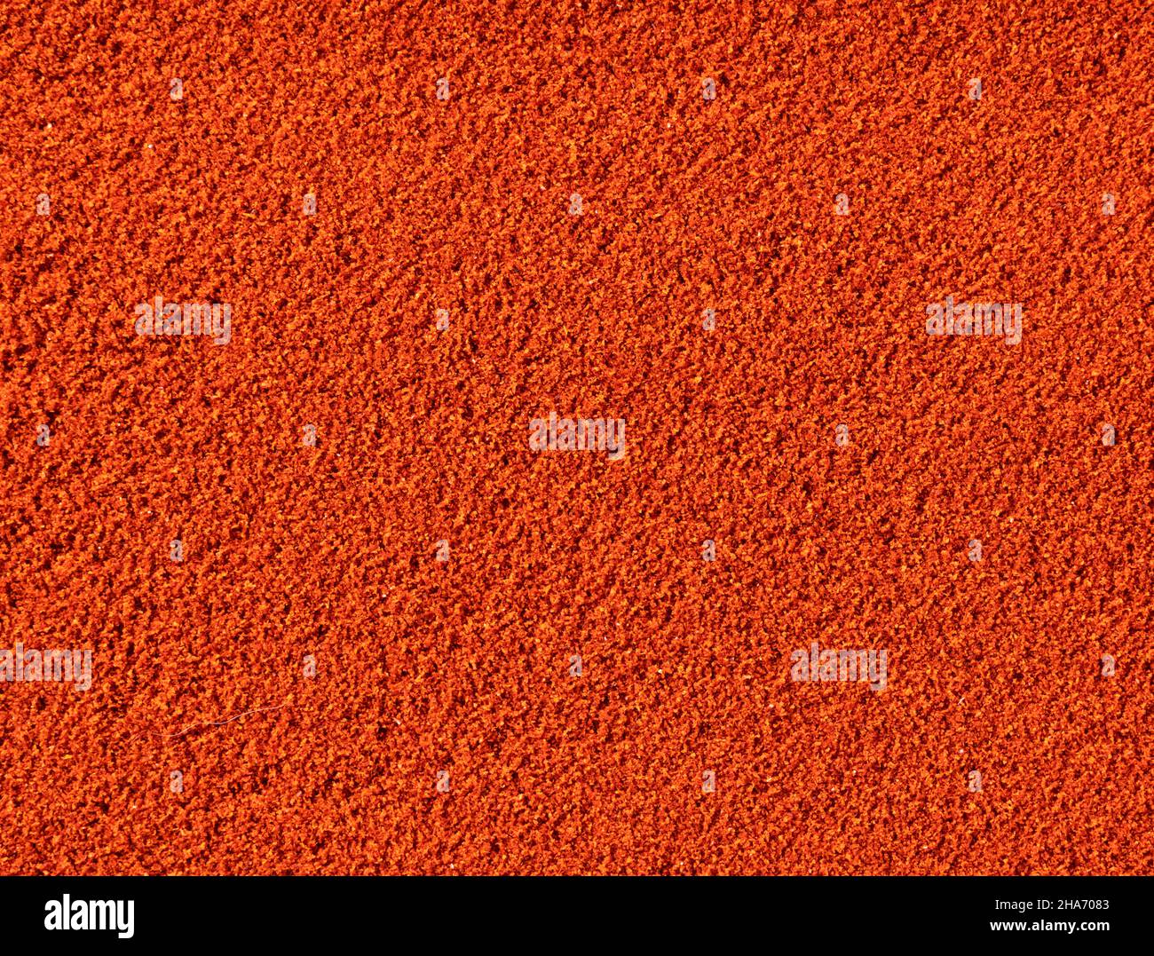 Red pepper powder all over the screen. Cayenne pepper. Paprika powder ...