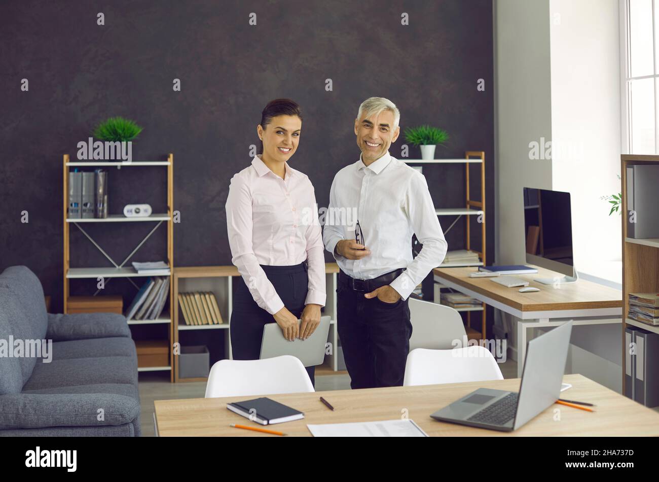 Happy confident smiling team manager and employee together Stock Photo ...