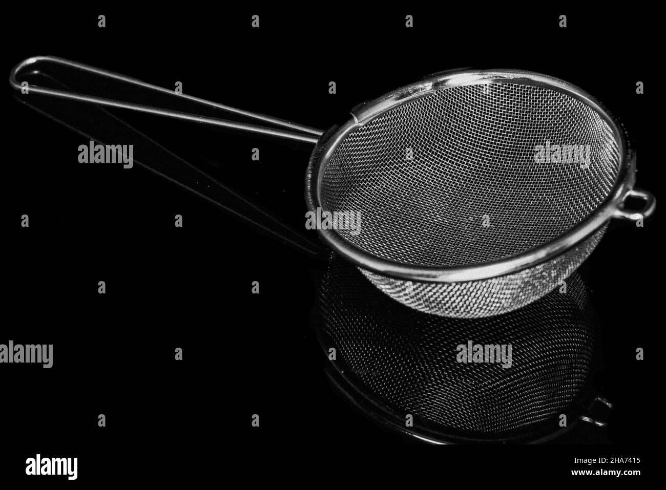 Mesh sieve Black and White Stock Photos & Images - Alamy