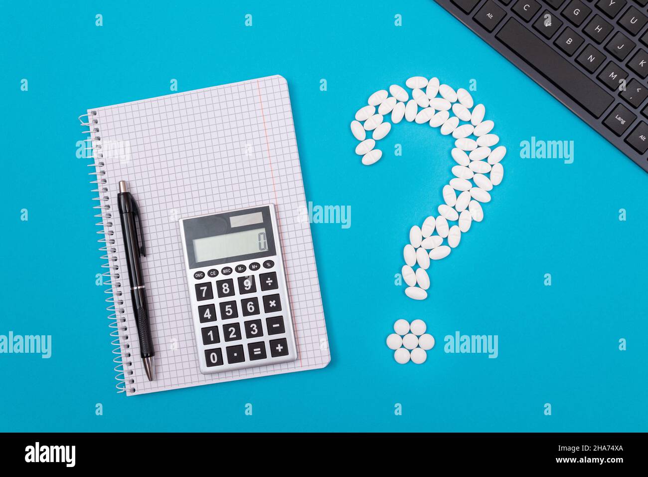 Treatment Costs and Budget. Question Mark Made from White Pills and ...