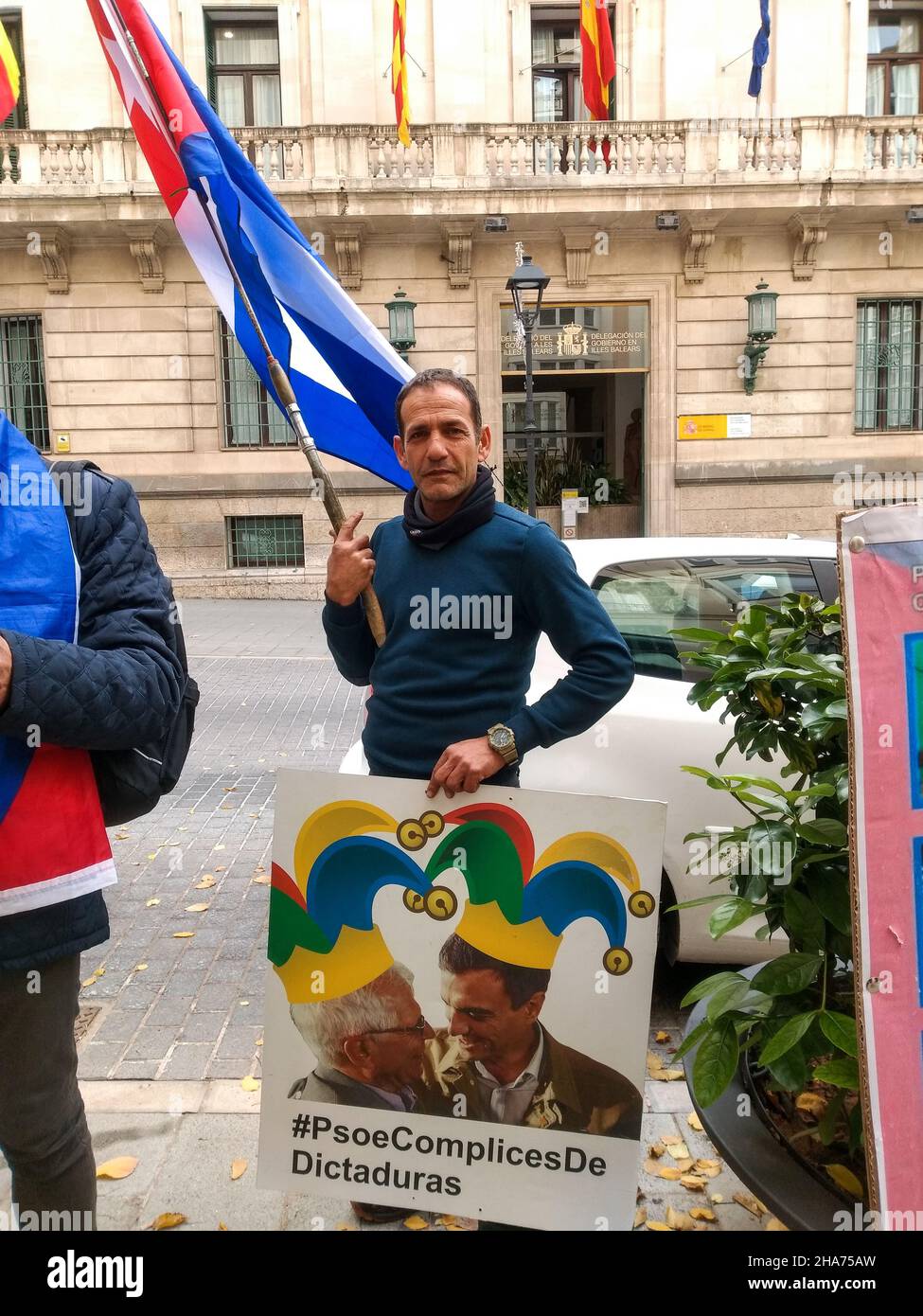 Palma de Mallorca, Spain; December 10th 2021: Cuban protester holding ...