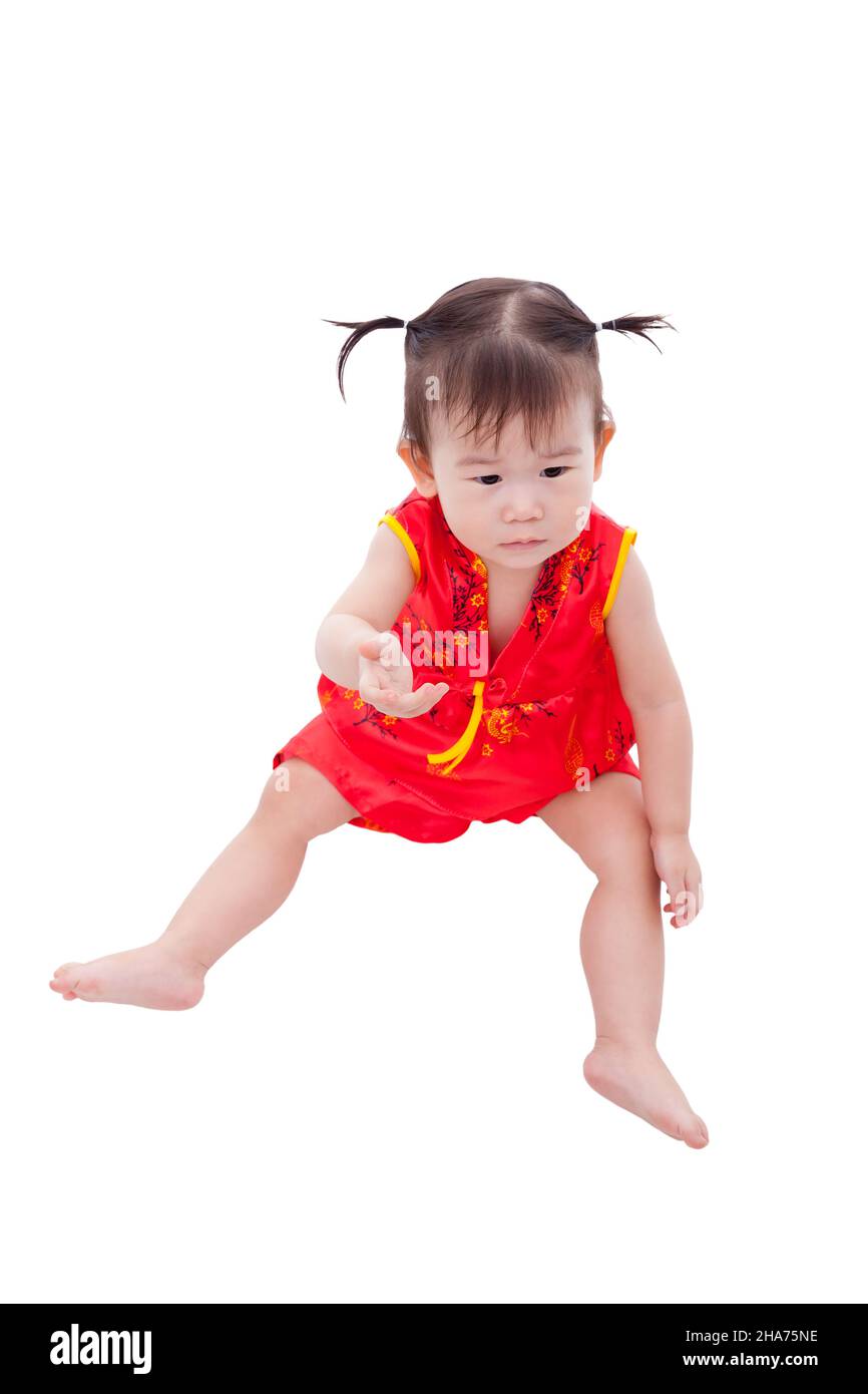 Little asian girl (thai) in traditional chinese dress, cheongsam is ...