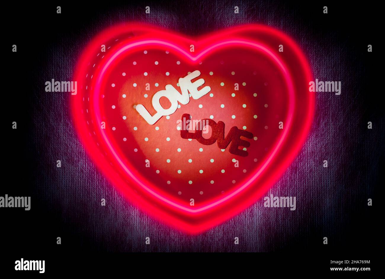Heart-shaped gift box and two text "LOVE" middle box with double magic ...