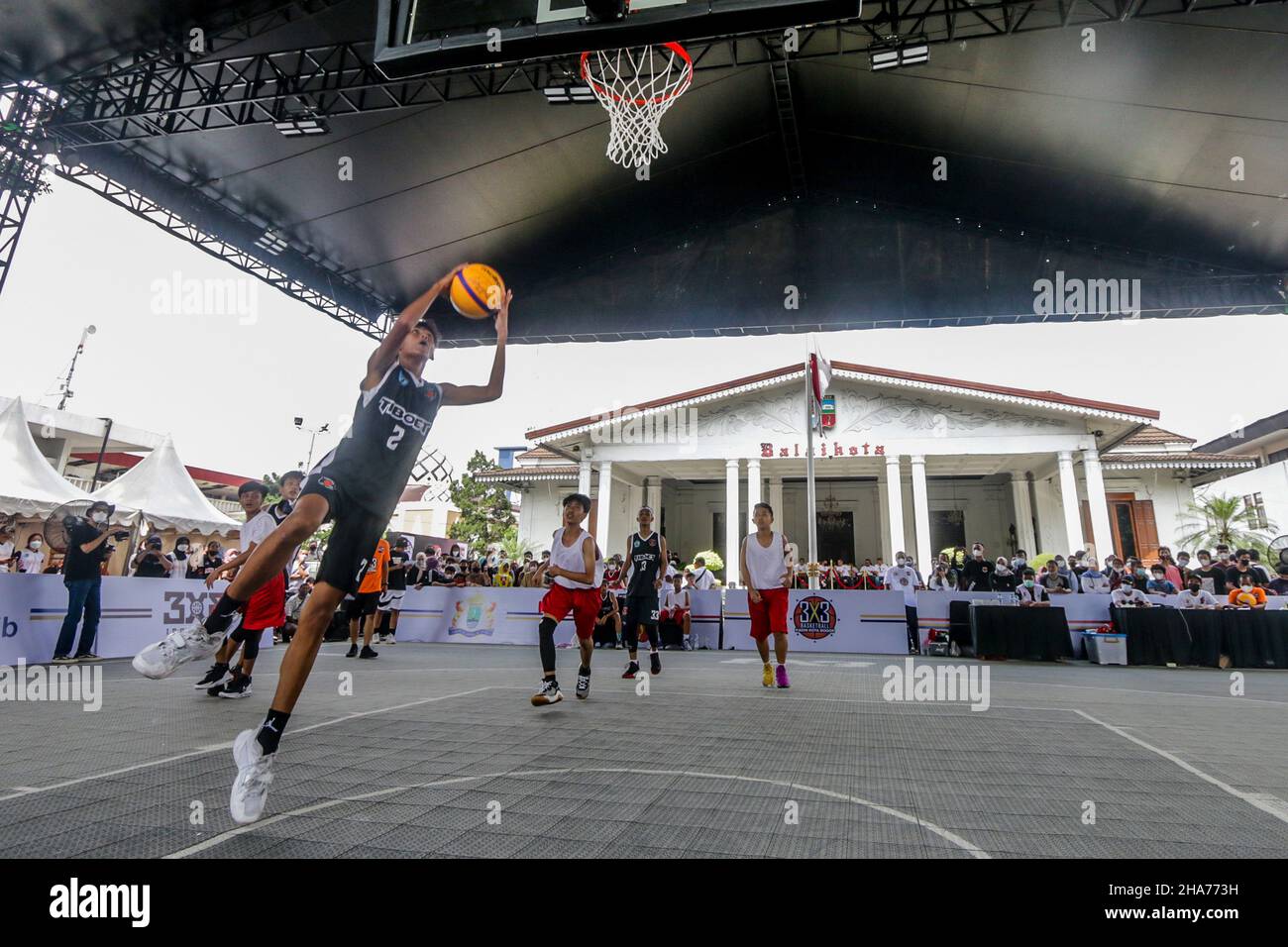Men play 3x3 basketball during a competition 3x3 basketball at city ...