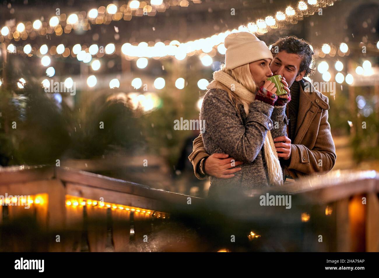 Romantic Christmas night.Couple outdoor in winter together Stock Photo ...