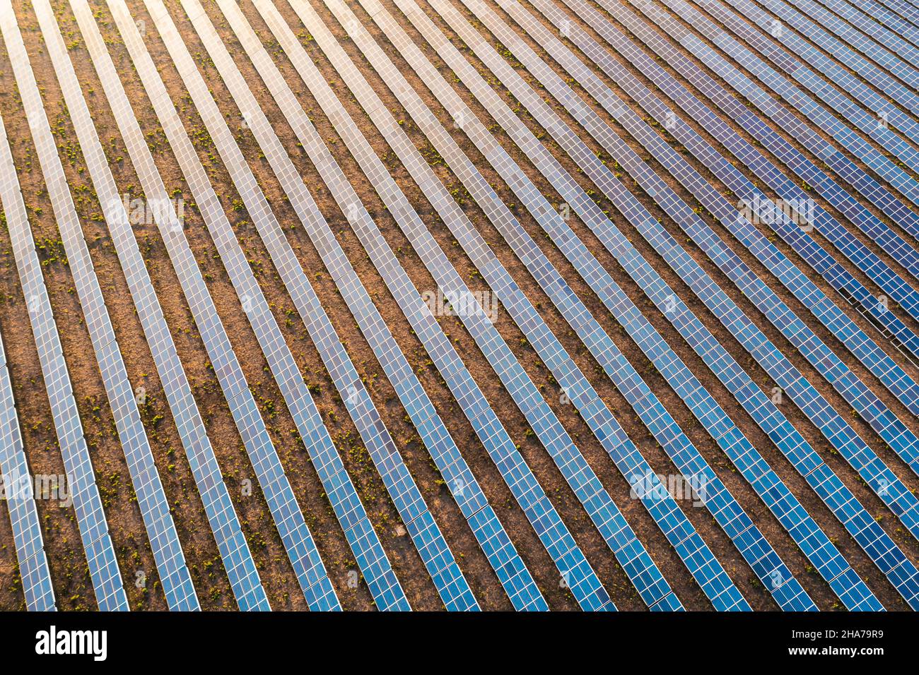 Aerial view of solar power plant. Drone flying above ground-mounted ...