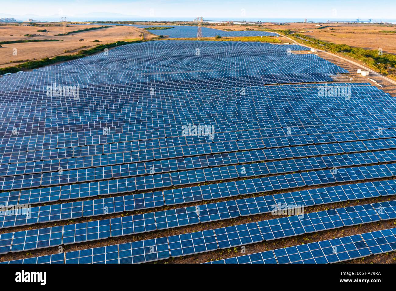 Aerial view of solar power plant. Drone flying above ground-mounted ...