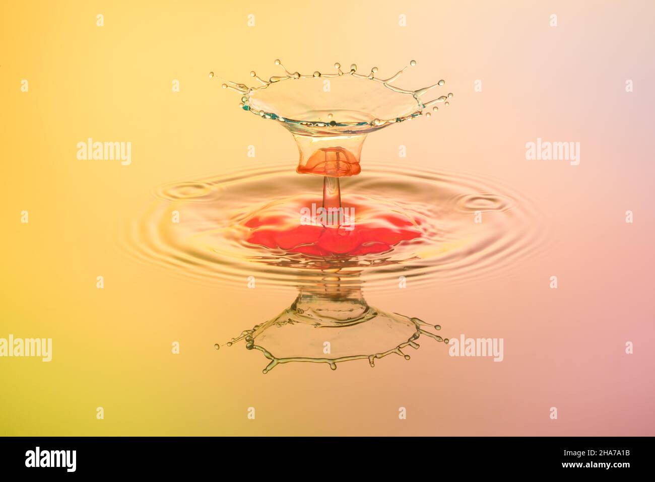 Water drop splash with reflection Stock Photo - Alamy