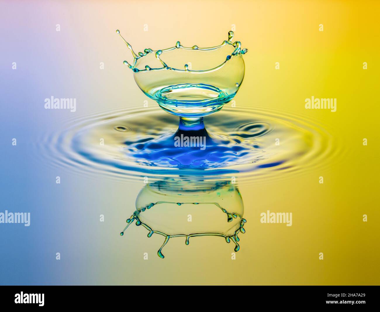 Water drop splash with reflection Stock Photo - Alamy