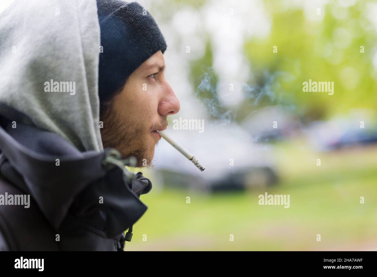 Fashion model smoking cigarette hi-res stock photography and images - Alamy