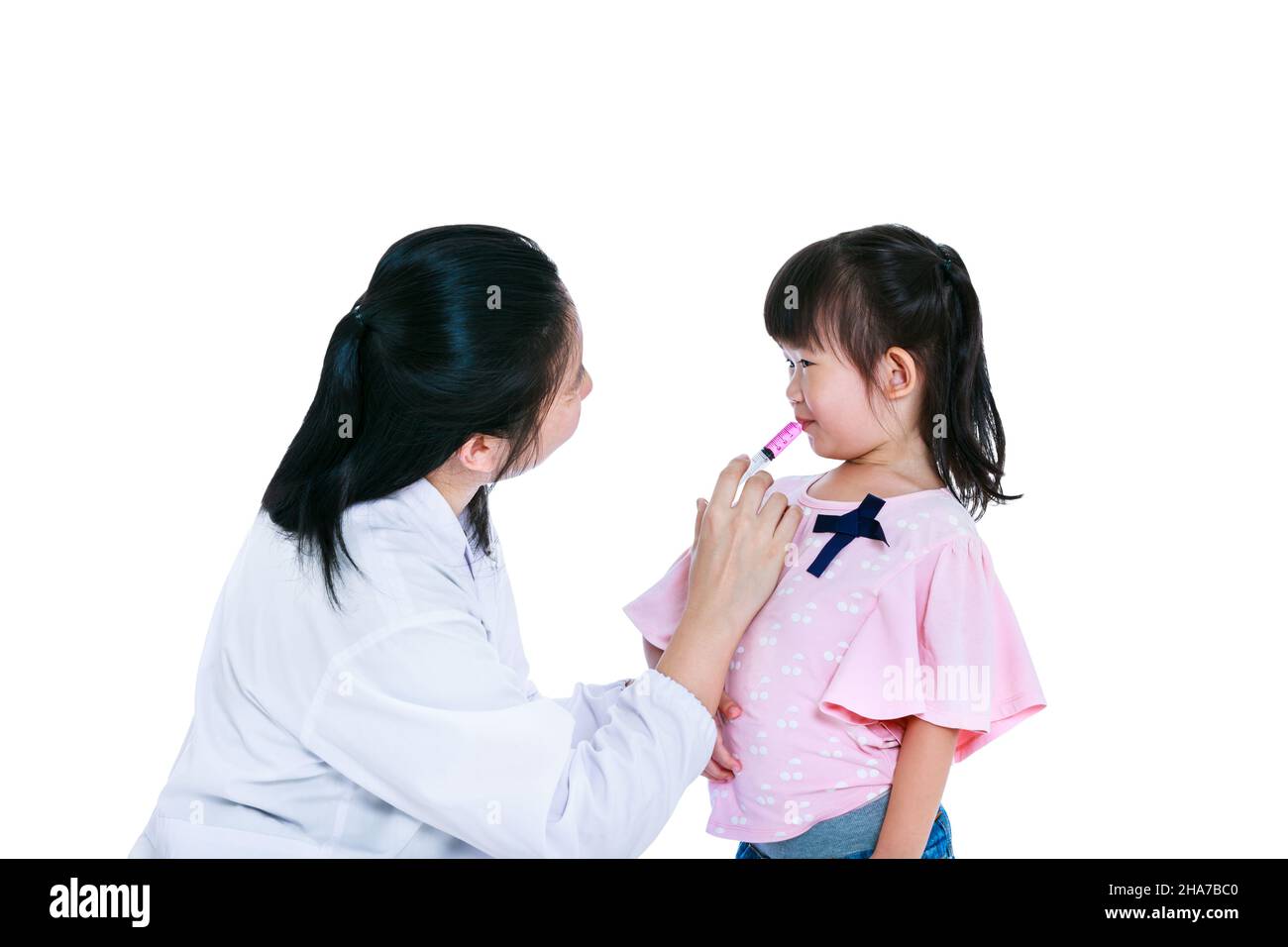 Child medicine nurse syrup Cut Out Stock Images & Pictures - Alamy