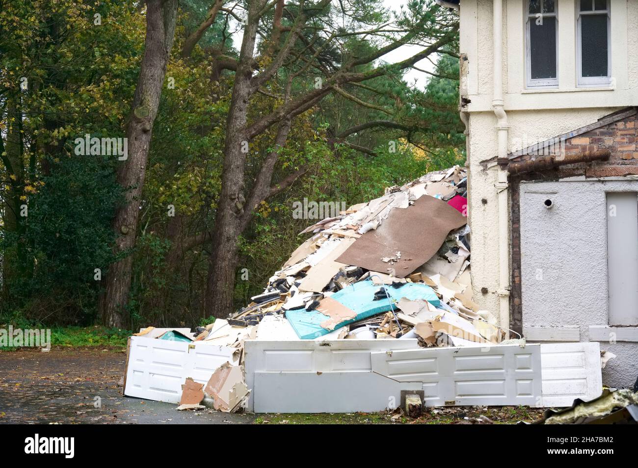 Demolition in progress of derelict house on construction building site ...