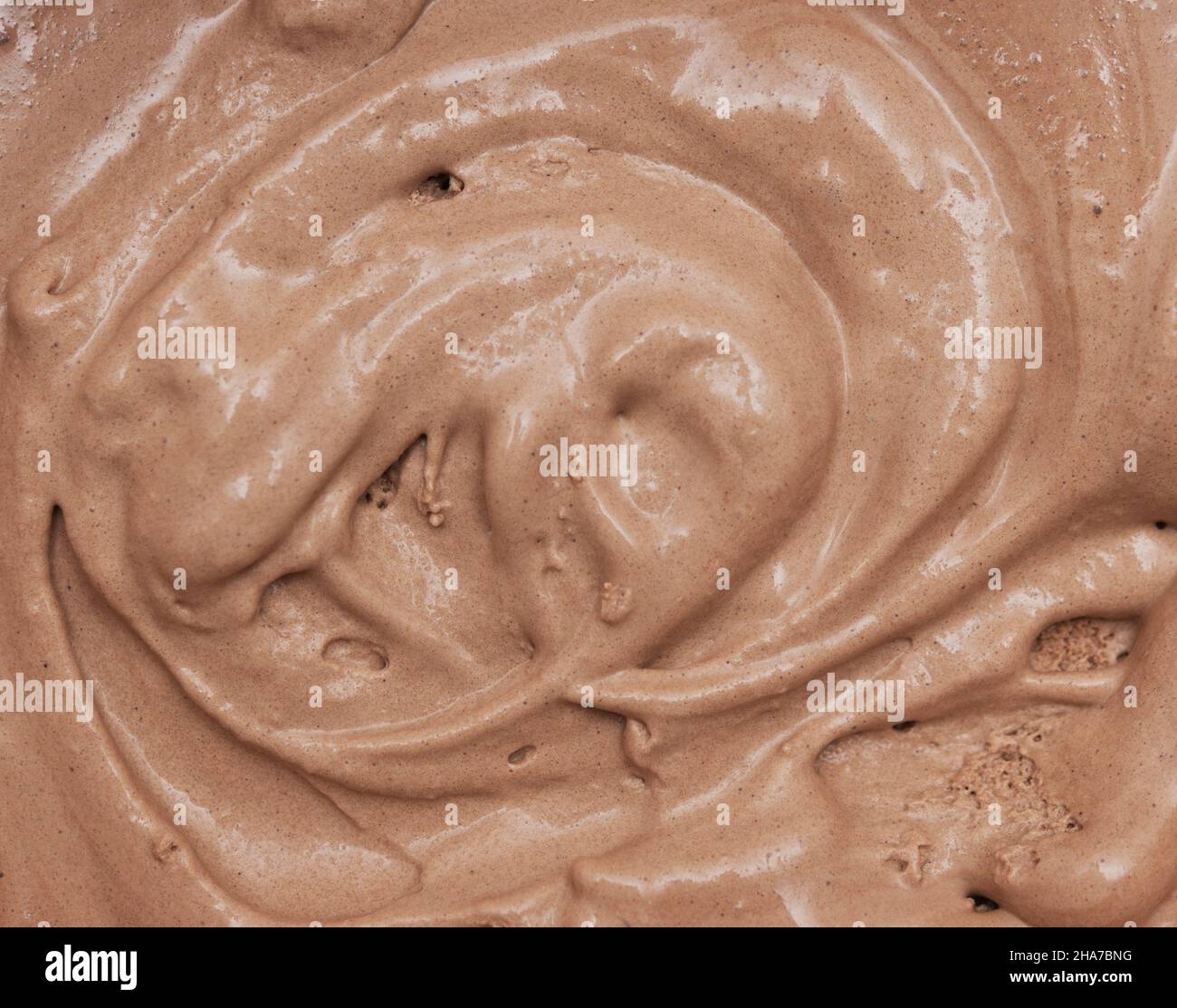 Melted chocolate ice cream background Stock Photo - Alamy