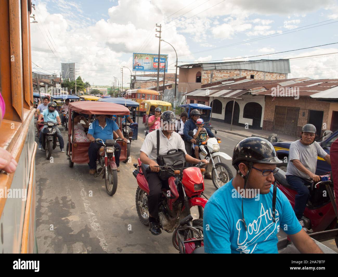 Iquitos, Peru - May, 2016: Colorful rickshaws on the street of town in ...
